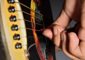 Coated Vs Uncoated Guitar Strings - Which Is Best? | Ted's List